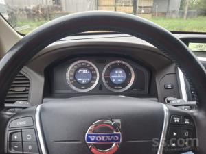Red Volvo XC60 2010 in Riga, with an engine capacity of 2.40 L and mileage of 306 thousand km for 8495 €, photo 18 on AUTOMOTO.COM.LV