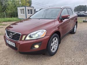 Sarkans Volvo XC60 2010 Rīga, ar dzinēja tilpumu 2.40 L un nobraukumu 306 tūkst. km par 8495 €, foto  vietnē AUTOMOTO.COM.LV