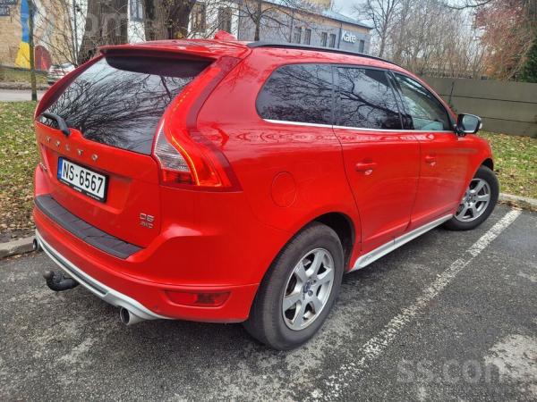 Red Volvo XC60 2011 in Riga, with an engine capacity of 2.40 L and mileage of 272 thousand km for 9700 €, photo 1 on AUTOMOTO.COM.LV