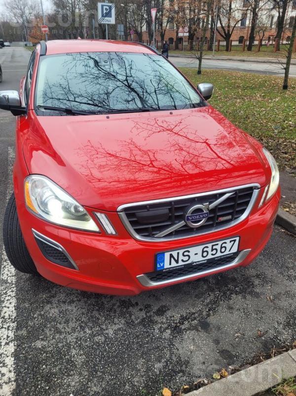Red Volvo XC60 2011 in Riga, with an engine capacity of 2.40 L and mileage of 272 thousand km for 9700 €, photo 3 on AUTOMOTO.COM.LV