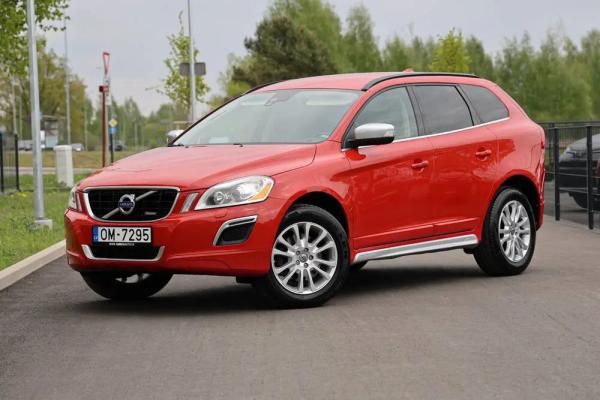 Red Volvo XC60 2011 in Jelgava, with an engine capacity of 2.40 L and mileage of 299 thousand km for 10250 €, photo 1 on AUTOMOTO.COM.LV