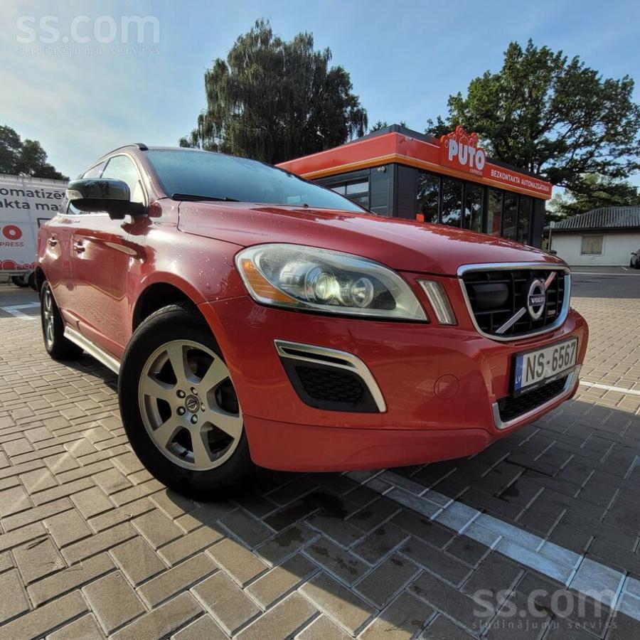 Red Volvo XC60 2011 in Riga, with an engine capacity of 2.40 L and mileage of 279 thousand km for 7800 €, photo 1 on AUTOMOTO.COM.LV