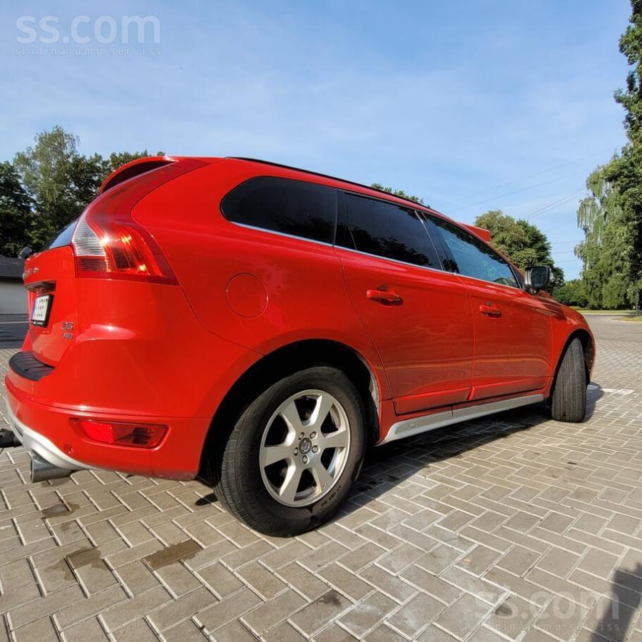 Red Volvo XC60 2011 in Riga, with an engine capacity of 2.40 L and mileage of 279 thousand km for 7800 €, photo 4 on AUTOMOTO.COM.LV