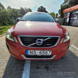Red Volvo XC60 2011 in Riga, with an engine capacity of 2.40 L and mileage of 279 thousand km for 7800 €, photo 5 on AUTOMOTO.COM.LV