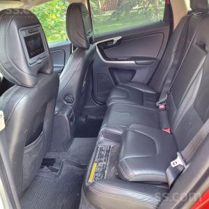 Red Volvo XC60 2011 in Riga, with an engine capacity of 2.40 L and mileage of 279 thousand km for 7800 €, photo 9 on AUTOMOTO.COM.LV