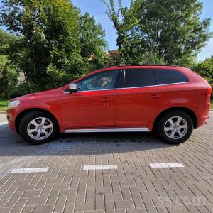 Red Volvo XC60 2011 in Riga, with an engine capacity of 2.40 L and mileage of 279 thousand km for 7800 €, photo 14 on AUTOMOTO.COM.LV