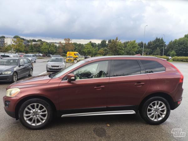Red Volvo XC60 2011 in Vilnius, with an engine capacity of 3.00 L and mileage of 262 thousand km for 5200 €, photo 5 on AUTOMOTO.COM.LV