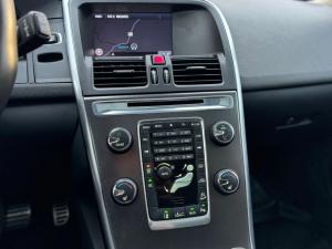 Red Volvo XC60 2012 in Riga, with an engine capacity of 2.40 L and mileage of 239 thousand km for 11250 €, photo 13 on AUTOMOTO.COM.LV