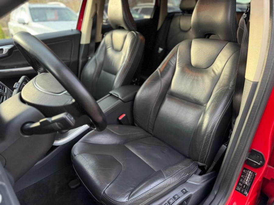Red Volvo XC60 2012 in Riga, with an engine capacity of 2.40 L and mileage of 239 thousand km for 11250 €, photo 28 on AUTOMOTO.COM.LV