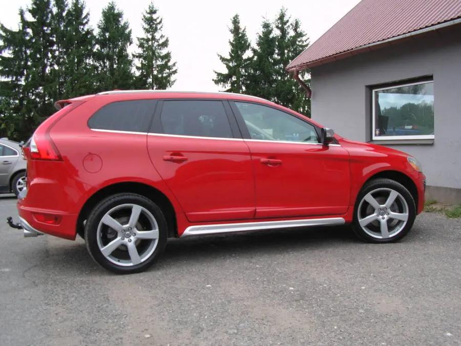 Red Volvo XC60 2012 in Sigulda, with an engine capacity of 2.00 L and mileage of 215 thousand km for 9950 €, photo 4 on AUTOMOTO.COM.LV