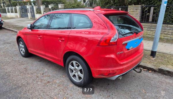 Red Volvo XC60 2013 in Vilnius, with an engine capacity of 2.40 L and mileage of 328 thousand km for 13300 €, photo 2 on AUTOMOTO.COM.LV