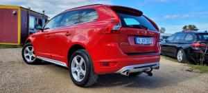 Red Volvo XC60 2013 in Riga, with an engine capacity of 2.40 L and mileage of 213 thousand km for 11500 €, photo 3 on AUTOMOTO.COM.LV