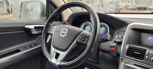 Red Volvo XC60 2013 in Riga, with an engine capacity of 2.40 L and mileage of 213 thousand km for 11500 €, photo 28 on AUTOMOTO.COM.LV