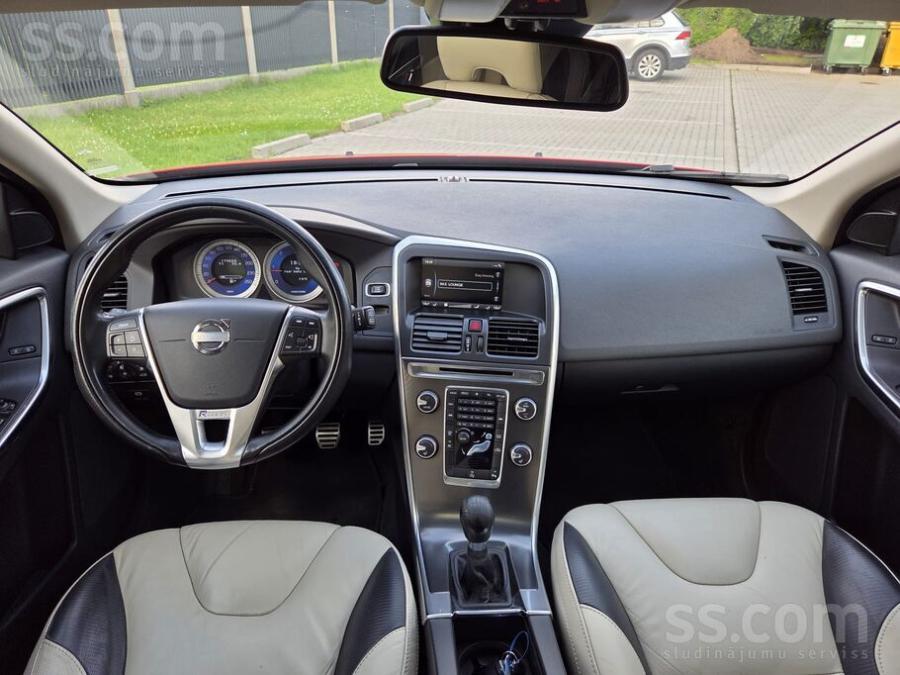 Red Volvo XC60 2013 in Riga, with an engine capacity of 2.00 L and mileage of 180 thousand km for 10500 €, photo 5 on AUTOMOTO.COM.LV