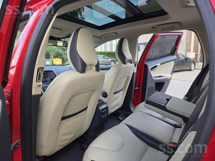 Red Volvo XC60 2013 in Riga, with an engine capacity of 2.00 L and mileage of 180 thousand km for 10500 €, photo 6 on AUTOMOTO.COM.LV