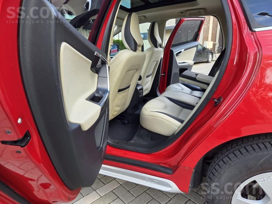 Red Volvo XC60 2013 in Riga, with an engine capacity of 2.00 L and mileage of 180 thousand km for 10500 €, photo 7 on AUTOMOTO.COM.LV