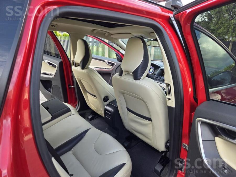 Red Volvo XC60 2013 in Riga, with an engine capacity of 2.00 L and mileage of 180 thousand km for 10500 €, photo 10 on AUTOMOTO.COM.LV