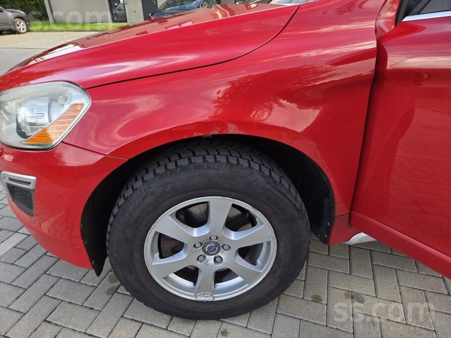Red Volvo XC60 2013 in Riga, with an engine capacity of 2.00 L and mileage of 180 thousand km for 10500 €, photo 12 on AUTOMOTO.COM.LV