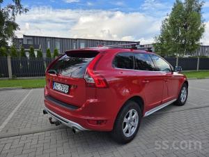Red Volvo XC60 2013 in Riga, with an engine capacity of 2.00 L and mileage of 180 thousand km for 10500 €, photo 13 on AUTOMOTO.COM.LV