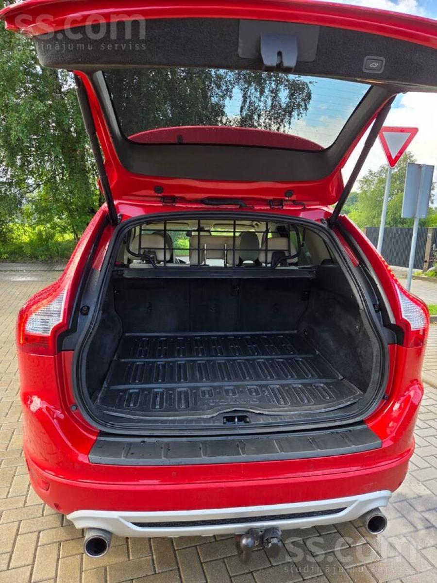Red Volvo XC60 2013 in Riga, with an engine capacity of 2.00 L and mileage of 180 thousand km for 10500 €, photo 16 on AUTOMOTO.COM.LV