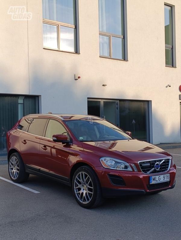 Red Volvo XC60 2013 in Kaunas, with an engine capacity of 2.40 L and mileage of 220 thousand km for 9500 €, photo 3 on AUTOMOTO.COM.LV
