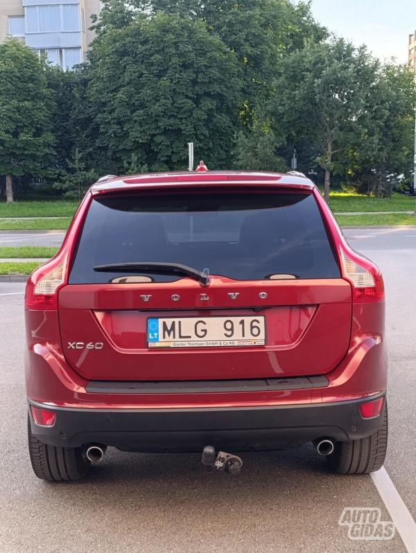 Red Volvo XC60 2013 in Kaunas, with an engine capacity of 2.40 L and mileage of 220 thousand km for 9500 €, photo 6 on AUTOMOTO.COM.LV