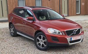 Sarkans Volvo XC60 2013 Raseiniai, ar dzinēja tilpumu 2.40 L un nobraukumu 289 tūkst. km par 7999 €, foto  vietnē AUTOMOTO.COM.LV