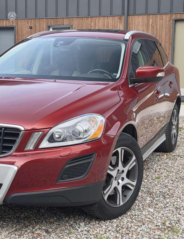 Red Volvo XC60 2013 in Raseiniai, with an engine capacity of 2.40 L and mileage of 289 thousand km for 7999 €, photo 6 on AUTOMOTO.COM.LV