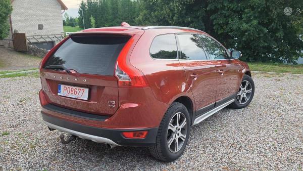 Red Volvo XC60 2013 in Raseiniai, with an engine capacity of 2.40 L and mileage of 289 thousand km for 7999 €, photo 8 on AUTOMOTO.COM.LV