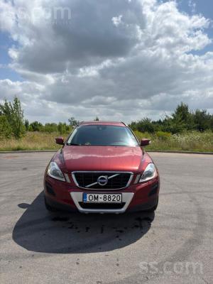 Red Volvo XC60 2013 in Dobele, with an engine capacity of 2.40 L and mileage of 309 thousand km for 8999 €, photo  on AUTOMOTO.COM.LV