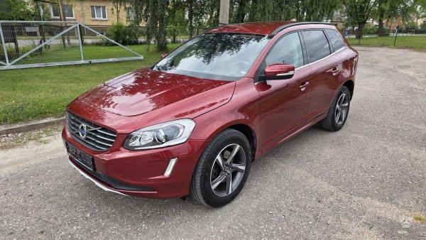 Red Volvo XC60 2014 in Siauliai, with an engine capacity of 2.40 L and mileage of 211 thousand km for 13350 €, photo 1 on AUTOMOTO.COM.LV
