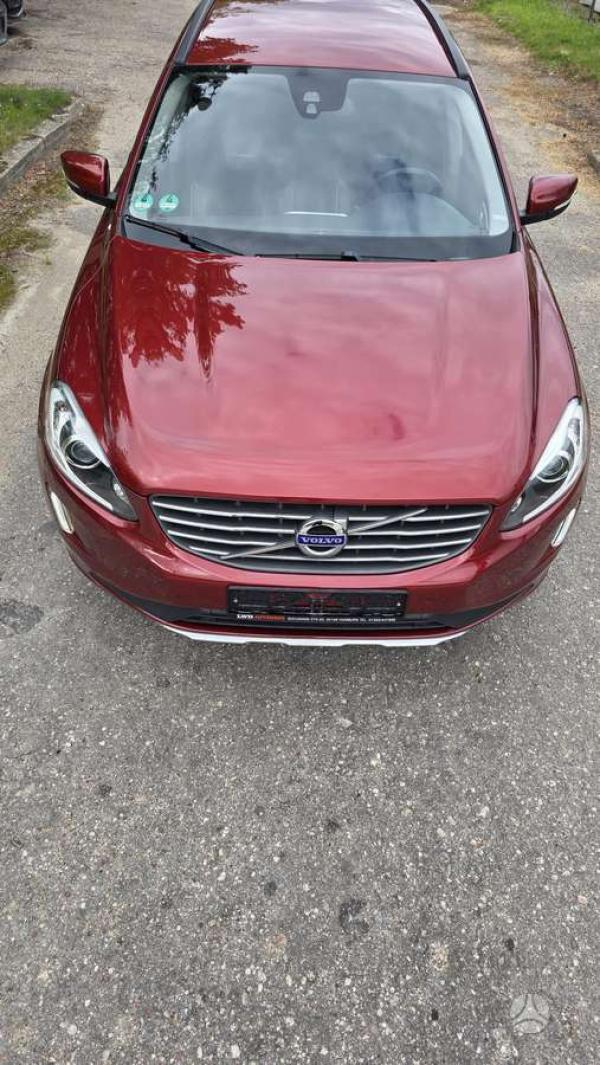 Red Volvo XC60 2014 in Siauliai, with an engine capacity of 2.40 L and mileage of 211 thousand km for 13350 €, photo 9 on AUTOMOTO.COM.LV
