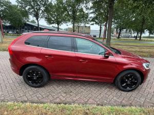 Red Volvo XC60 2014 in Jurmala, with an engine capacity of 2.00 L and mileage of 252 thousand km for 14750 €, photo 5 on AUTOMOTO.COM.LV