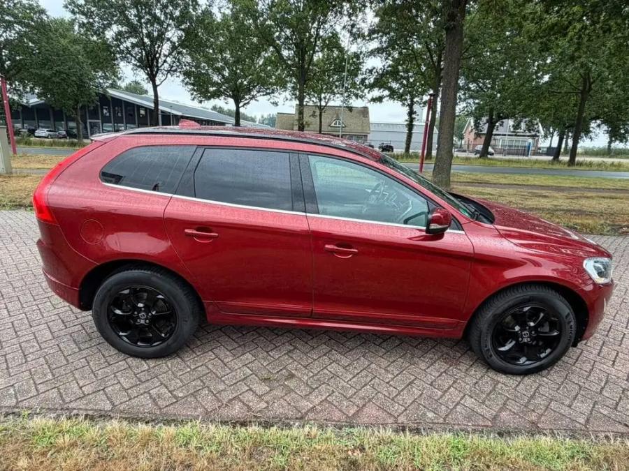 Red Volvo XC60 2014 in Jurmala, with an engine capacity of 2.00 L and mileage of 252 thousand km for 14750 €, photo 5 on AUTOMOTO.COM.LV