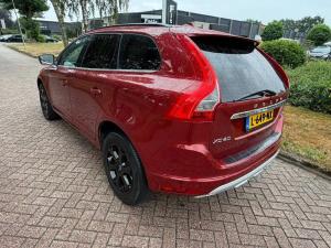 Red Volvo XC60 2014 in Jurmala, with an engine capacity of 2.00 L and mileage of 252 thousand km for 14750 €, photo 6 on AUTOMOTO.COM.LV