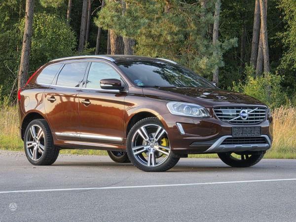 Red Volvo XC60 2014 in Vilnius, with an engine capacity of 2.40 L and mileage of 244 thousand km for 14350 €, photo 1 on AUTOMOTO.COM.LV