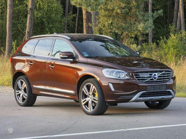 Red Volvo XC60 2014 in Vilnius, with an engine capacity of 2.40 L and mileage of 244 thousand km for 14350 €, photo 5 on AUTOMOTO.COM.LV