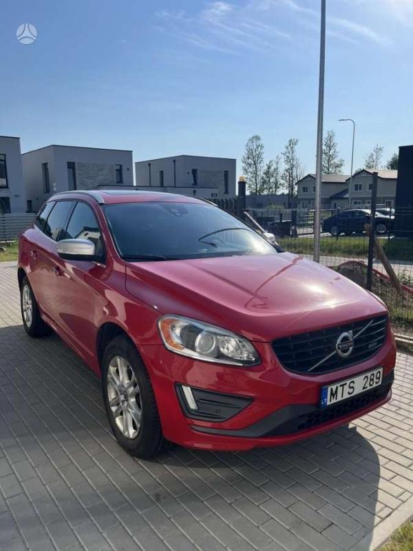Red Volvo XC60 2015 in Vilnius, with an engine capacity of 2.95 L and mileage of 325 thousand km for 10499 €, photo 1 on AUTOMOTO.COM.LV