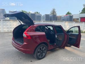 Red Volvo XC60 2017 in Riga, with an engine capacity of 2.40 L and mileage of 114 thousand km for 18100 €, photo 3 on AUTOMOTO.COM.LV