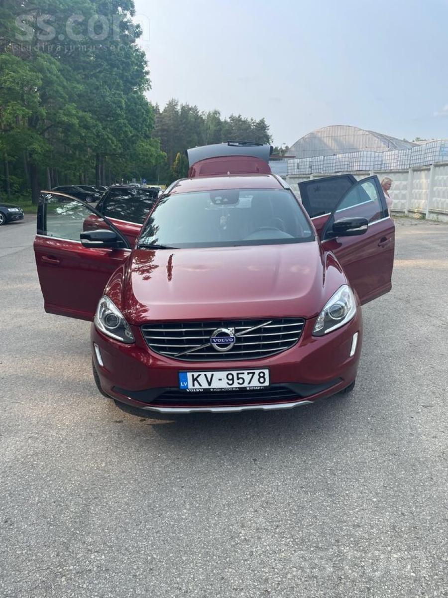 Red Volvo XC60 2017 in Riga, with an engine capacity of 2.40 L and mileage of 114 thousand km for 18100 €, photo 5 on AUTOMOTO.COM.LV