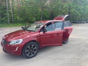 Red Volvo XC60 2017 in Riga, with an engine capacity of 2.40 L and mileage of 114 thousand km for 18100 €, photo 6 on AUTOMOTO.COM.LV