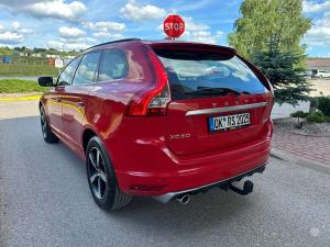 Red Volvo XC60 2017 in Vilnius, with an engine capacity of 2.40 L and mileage of 298 thousand km for 12699 €, photo 5 on AUTOMOTO.COM.LV