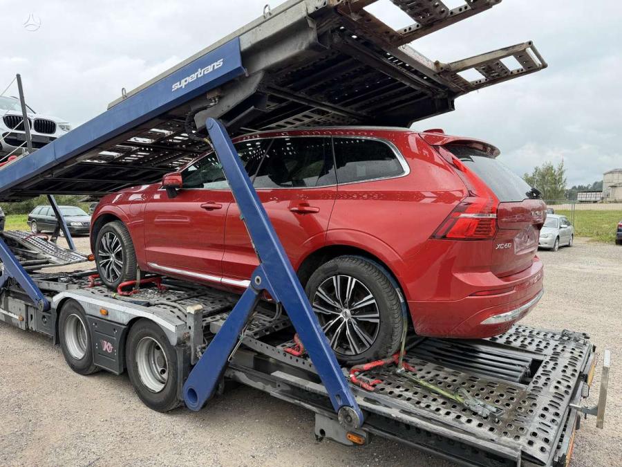 Red Volvo XC60 2021 in Utena, with an engine capacity of 1.97 L and mileage of 123 thousand km for 28850 €, photo 58 on AUTOMOTO.COM.LV