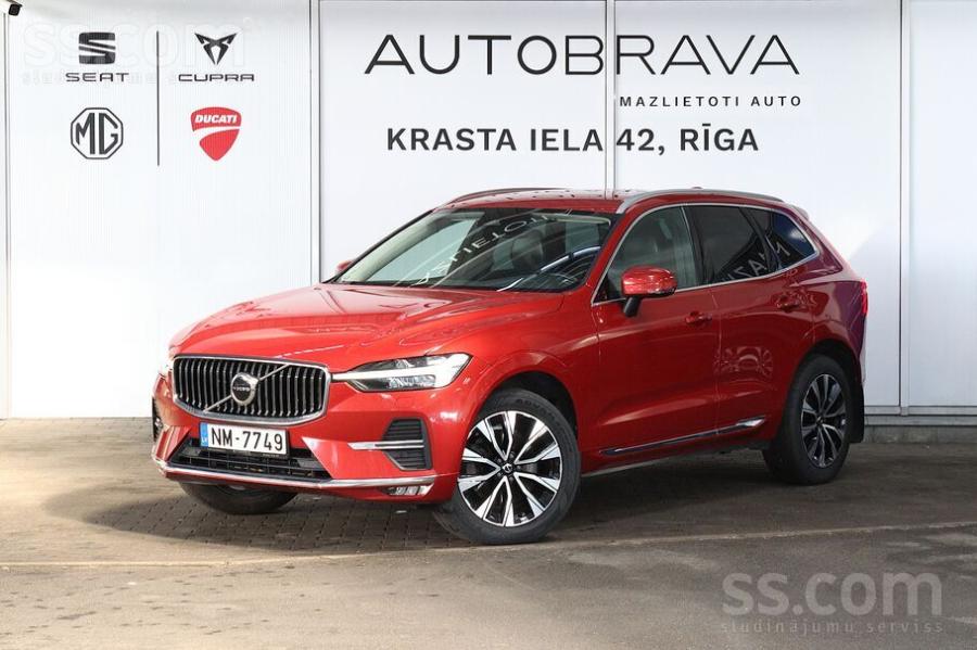 Red Volvo XC60 2023 in Riga, with an engine capacity of 2.00 L and mileage of 117 thousand km for 36900 €, photo 1 on AUTOMOTO.COM.LV