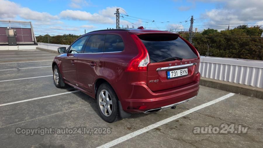 Red Volvo XC60 2014 in Tallinn, with an engine capacity of 2.00 L and mileage of 320 thousand km for 6990 €, photo 4 on AUTOMOTO.COM.LV