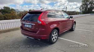 Red Volvo XC60 2014 in Tallinn, with an engine capacity of 2.00 L and mileage of 320 thousand km for 6990 €, photo 5 on AUTOMOTO.COM.LV