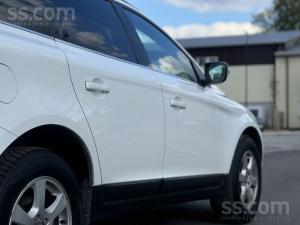White Volvo XC60 2009 in Valmiera, with an engine capacity of 2.40 L and mileage of 319 thousand km for 5390 €, photo 7 on AUTOMOTO.COM.LV