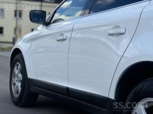 White Volvo XC60 2009 in Valmiera, with an engine capacity of 2.40 L and mileage of 319 thousand km for 5390 €, photo 12 on AUTOMOTO.COM.LV