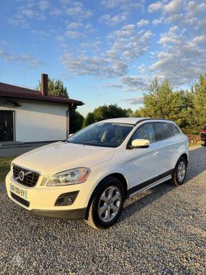 White Volvo XC60 2009 in Vilnius, with an engine capacity of 2.40 L and mileage of 329 thousand km for 6350 €, photo 4 on AUTOMOTO.COM.LV