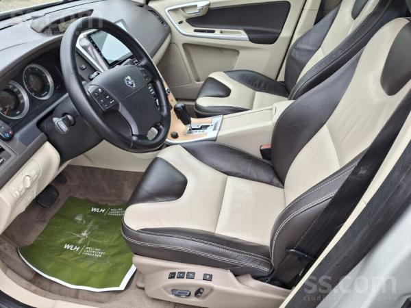 White Volvo XC60 2009 in Riga, with an engine capacity of 2.40 L and mileage of 295 thousand km for 8895 €, photo 10 on AUTOMOTO.COM.LV